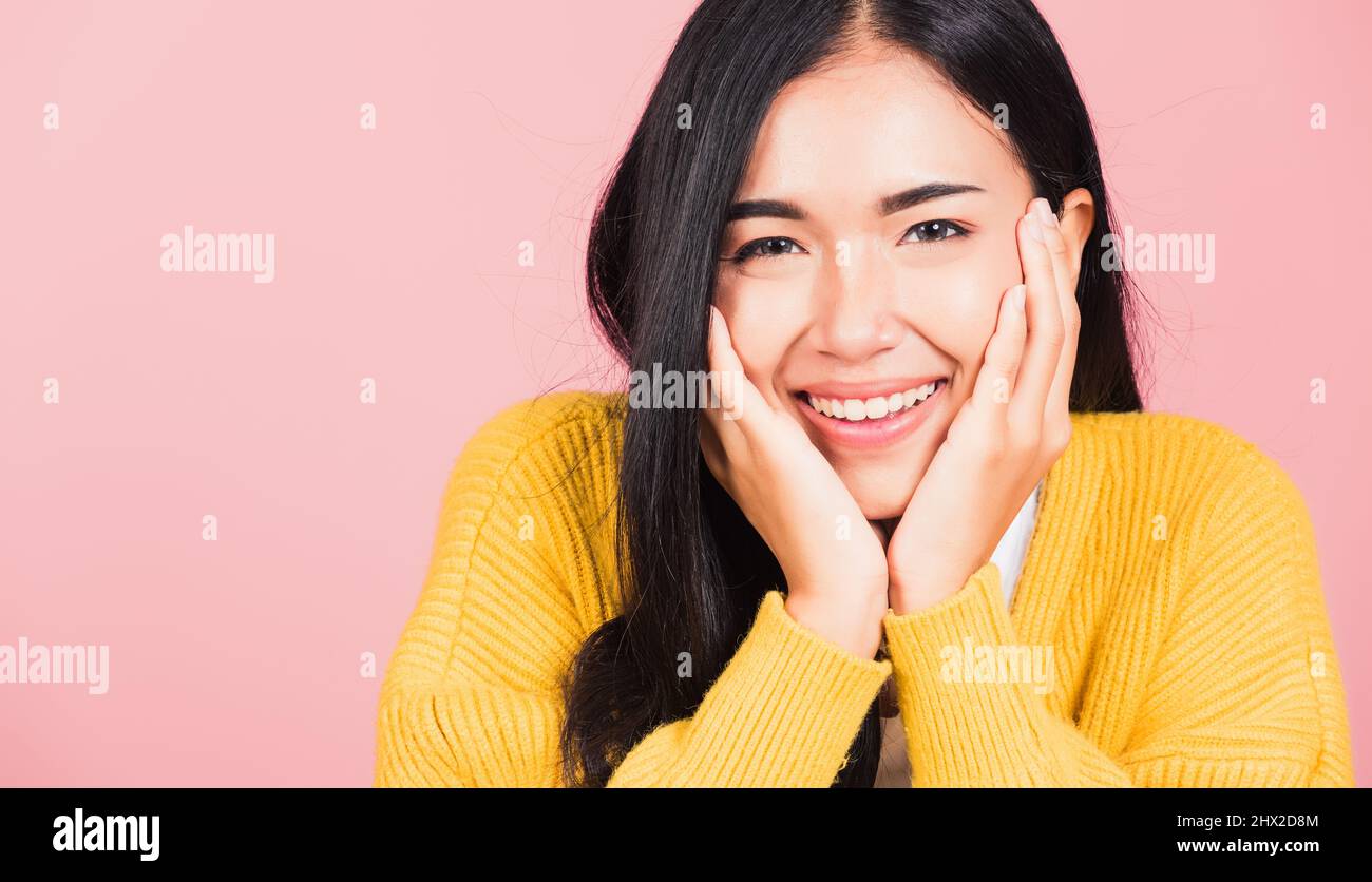 Happy Asian portrait beautiful cute young woman smile holding her ...