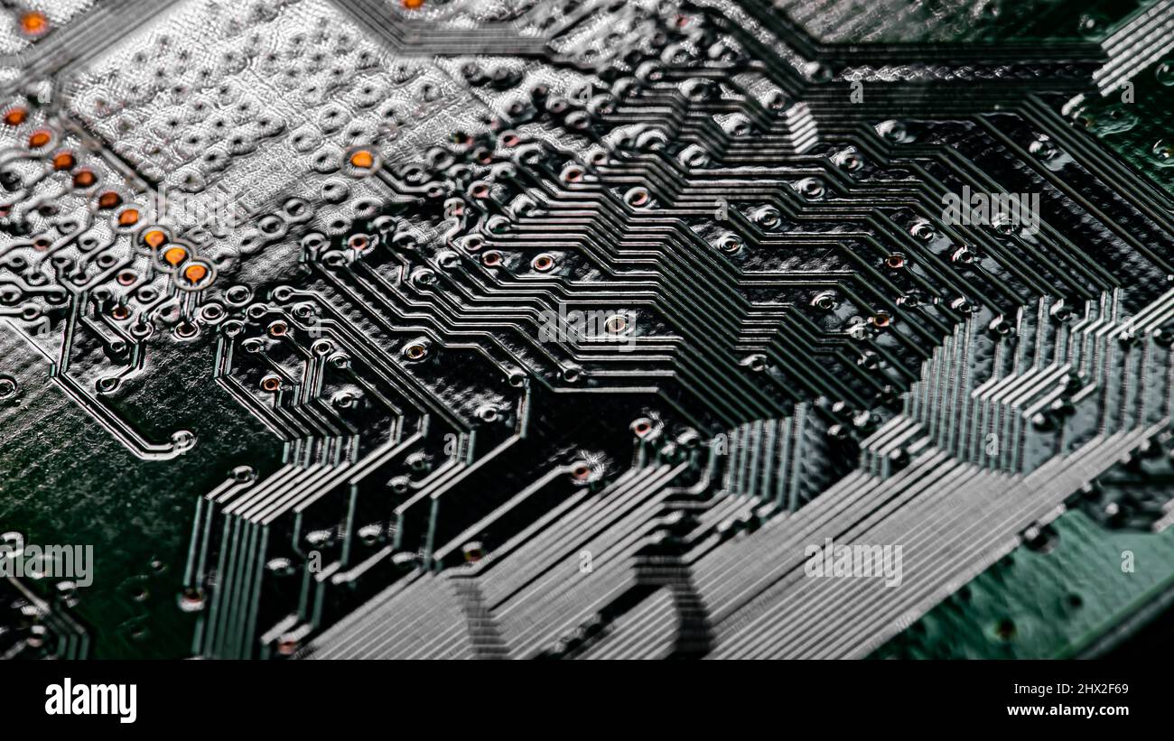 Macro Close up of printed wiring on PC circuit board of modem router ...