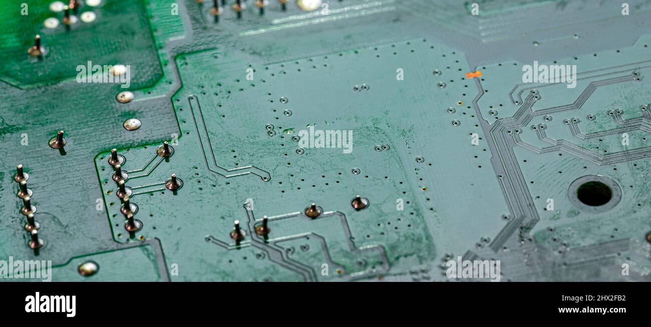 Macro Close up of printed wiring on PC circuit board of modem router ...