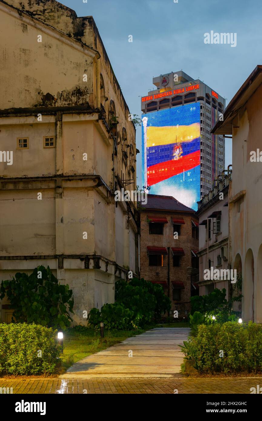 Menara DBKL 1 showing the Kuala Lumpur Flag, taken from a gap between ...