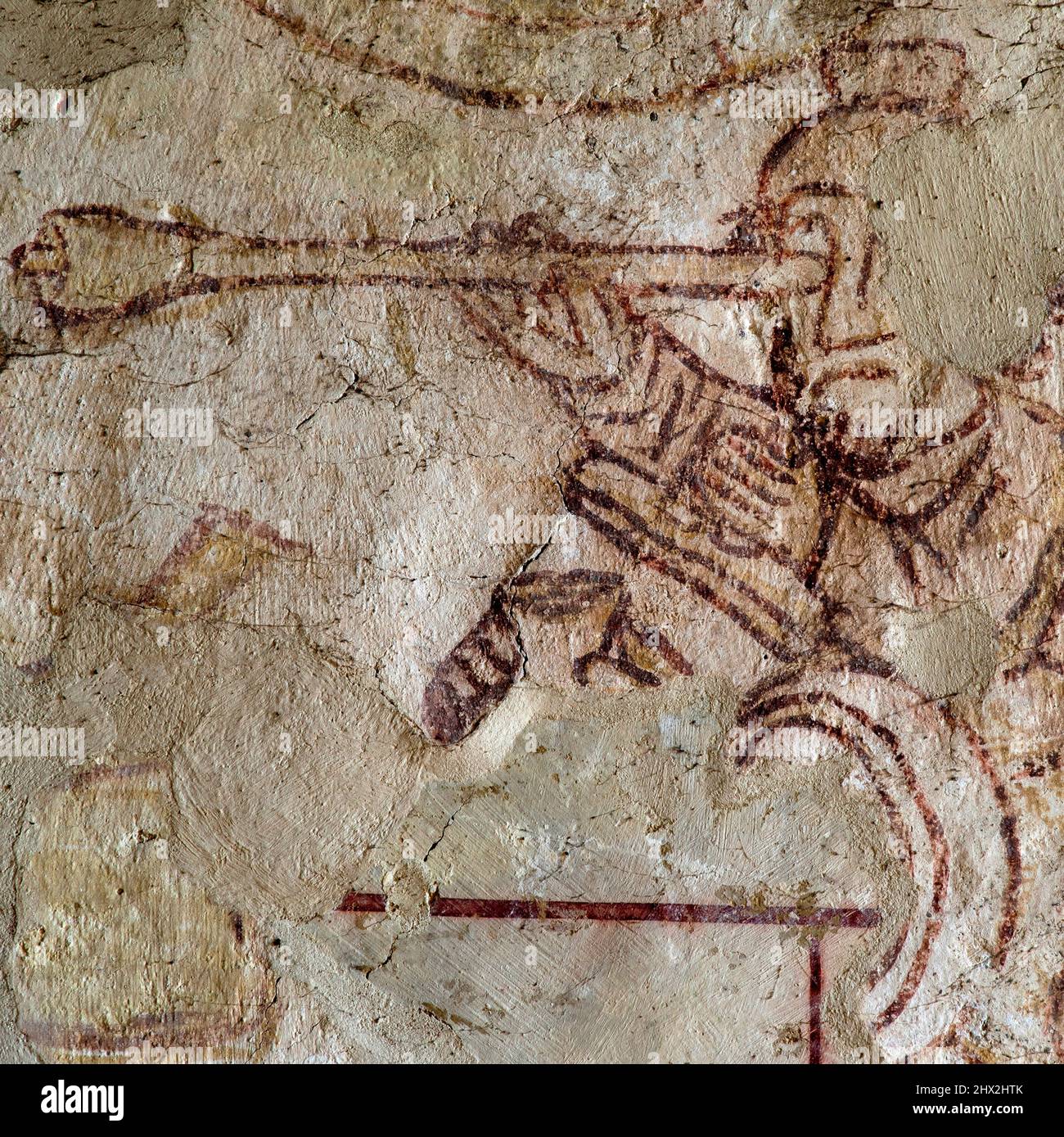 Medieval wheelwright holds cart wheel spoke to his eye to test its ...