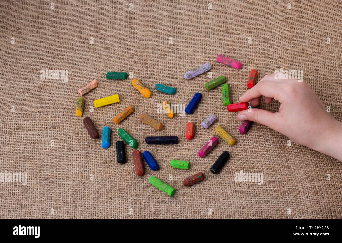 Holding a crayon hi-res stock photography and images - Alamy