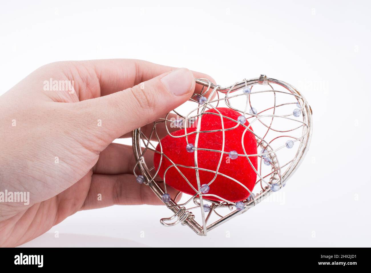 Cage heart hi-res stock photography and images - Alamy