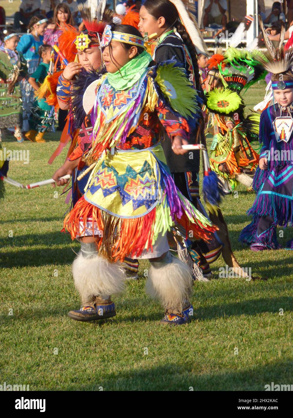 Native American dances taking part in pow wow festival in costume Stock ...