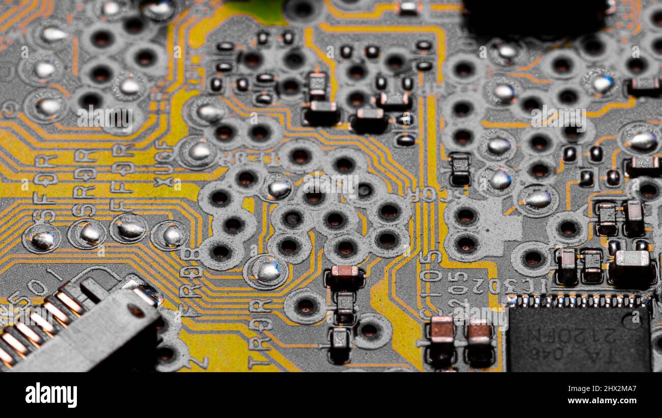 Macro Close up of printed wiring and components on PC circuit board ...