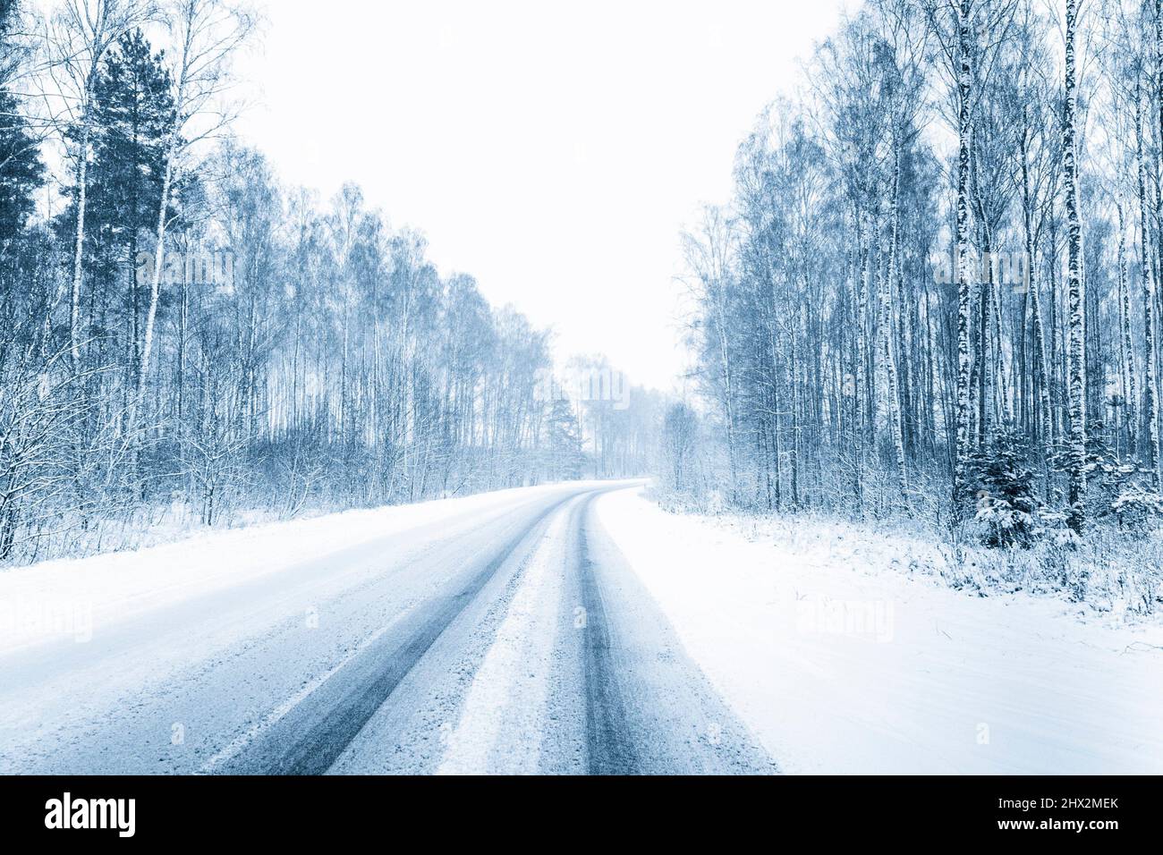 Snow-covered Open Road During A Snowstorm In Winter. Adverse Weather ...