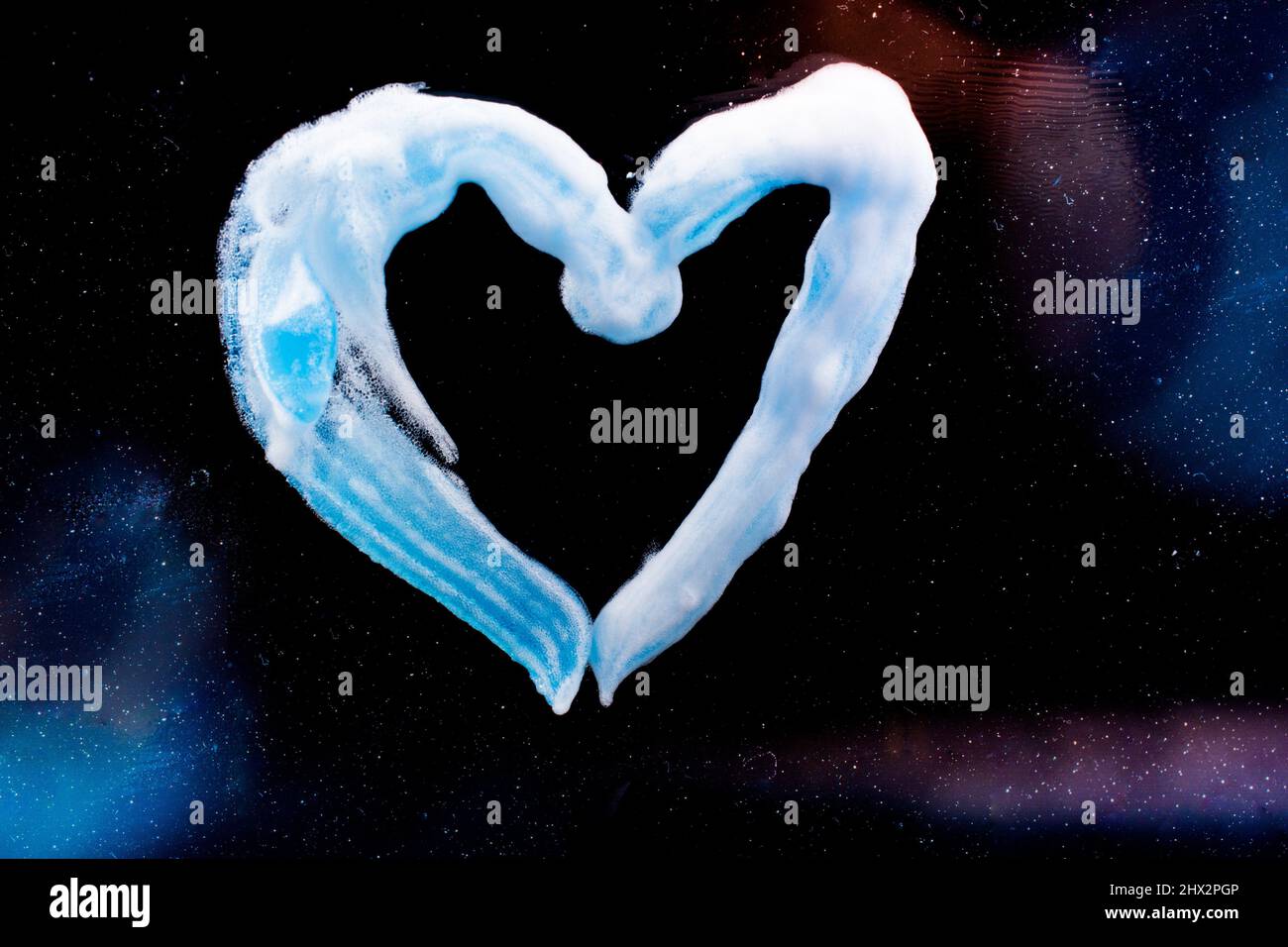 Colorful decorative objects in the shape of a heart Stock Photo - Alamy