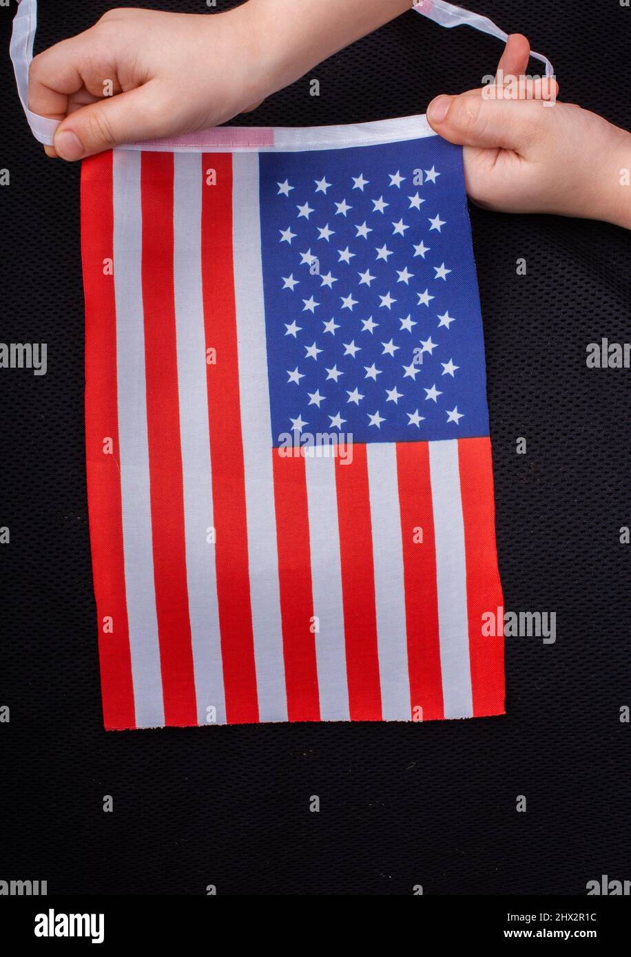 Kid hand american flag hi-res stock photography and images - Alamy