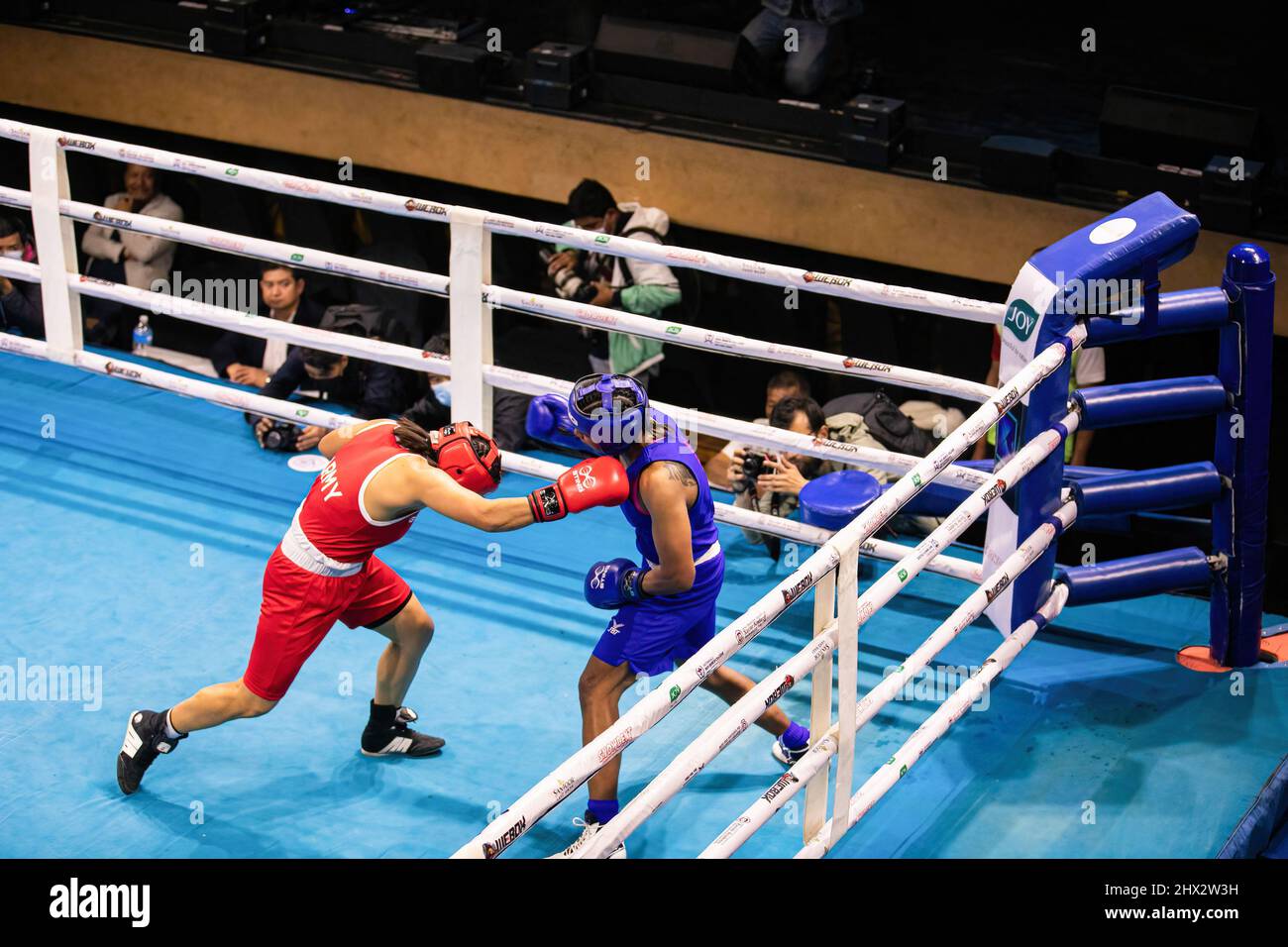 Nepalese woman boxer Sangita Sunwar (in blue jersey) seen during a ...