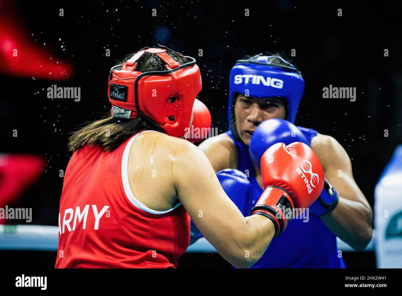 Nepalese woman boxer Sangita Sunwar (in blue jersey) seen during a ...