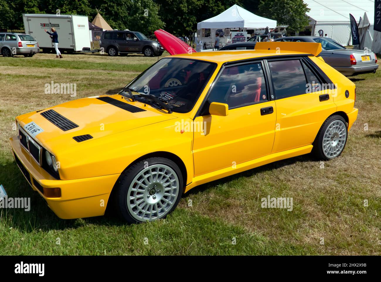 View of a Yellow, 1992 Lancia Delta HF Integrale Evo 1, on display at ...