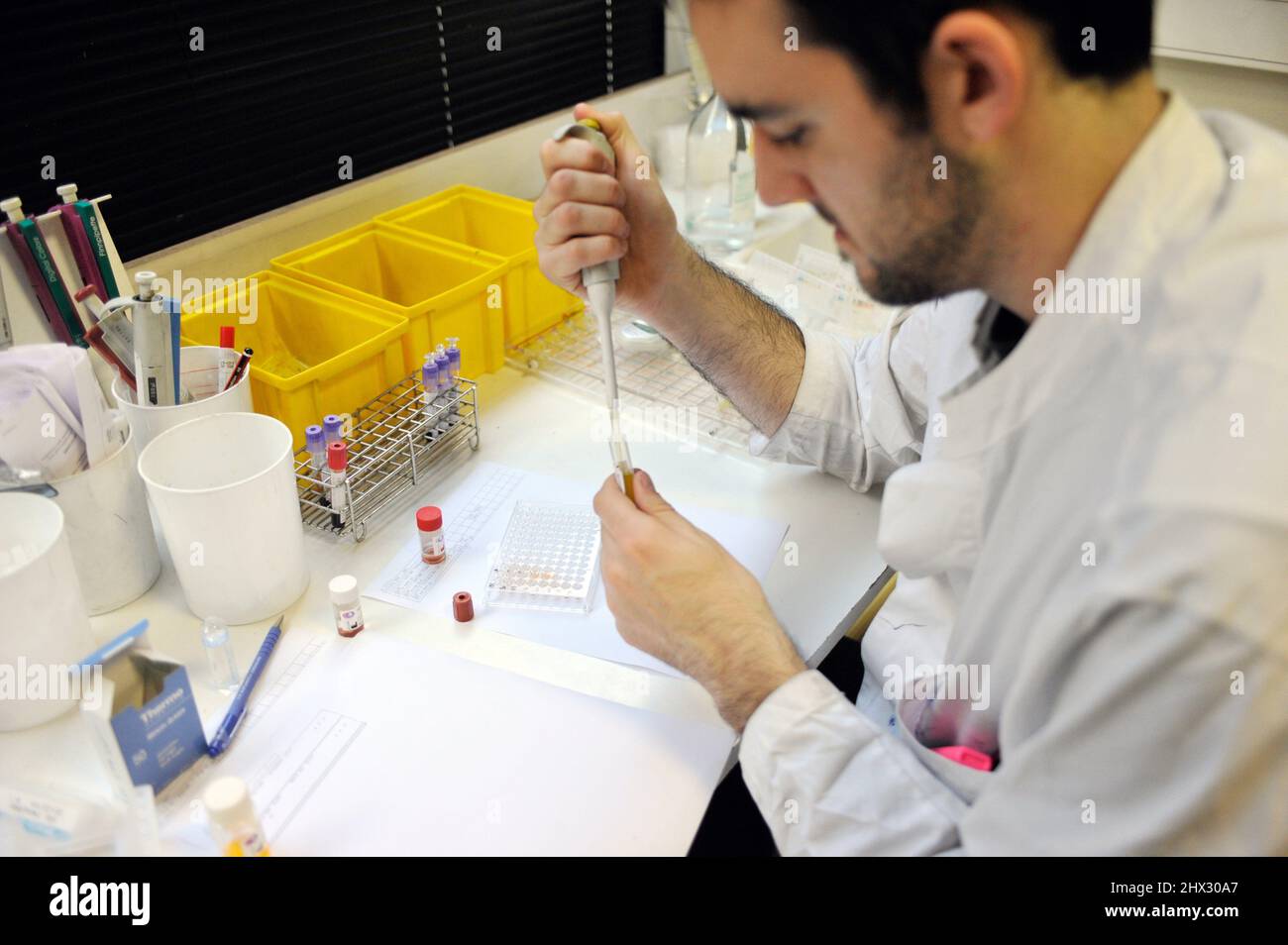 FRANCE - PARIS - LABORATORY A laboratory technician handles a variable ...