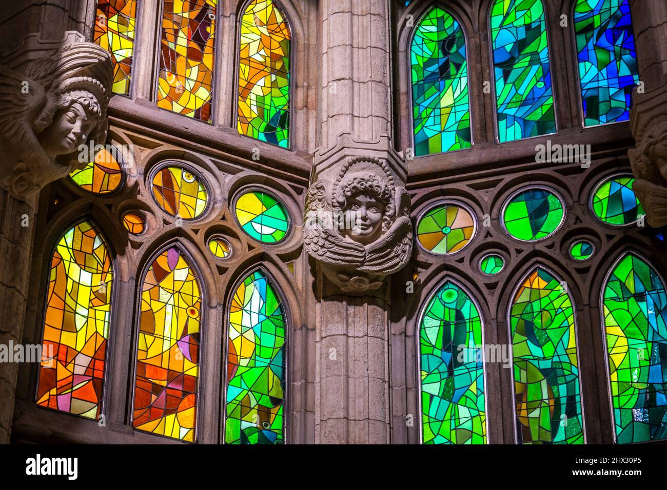 The famous stained-glass windows inside the Sagrada Familia by Antoni ...