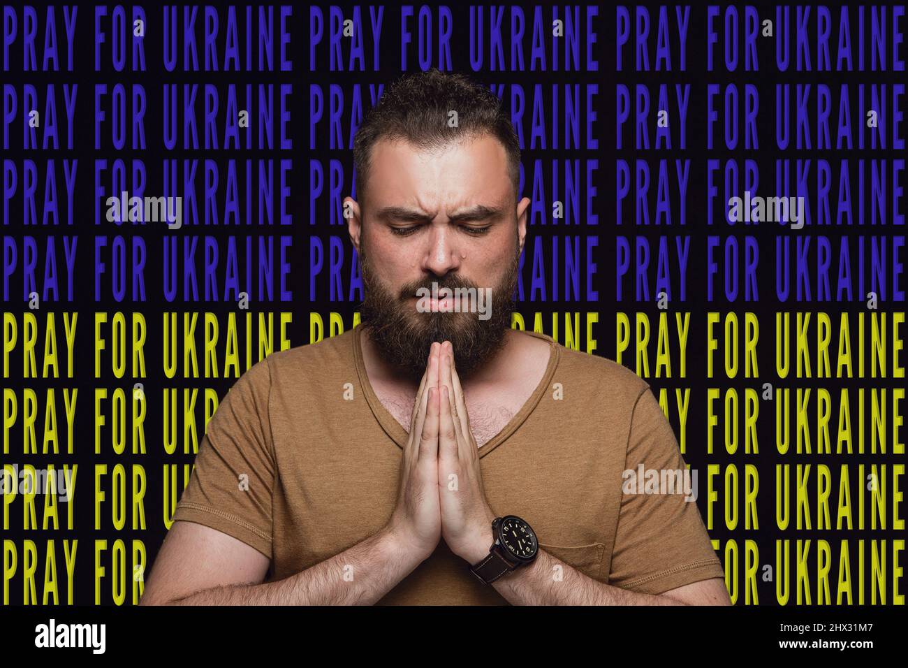 Portrait of Ukrainian man praying for Ukrainian safety and peace ...