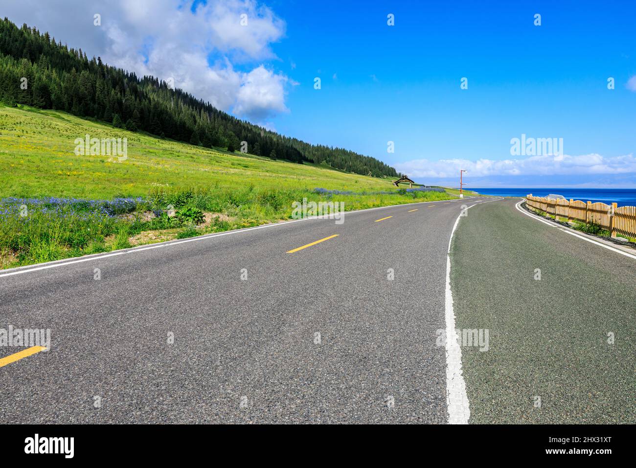 Empty asphalt road and azure ocean nature scenery under blue sky Stock ...