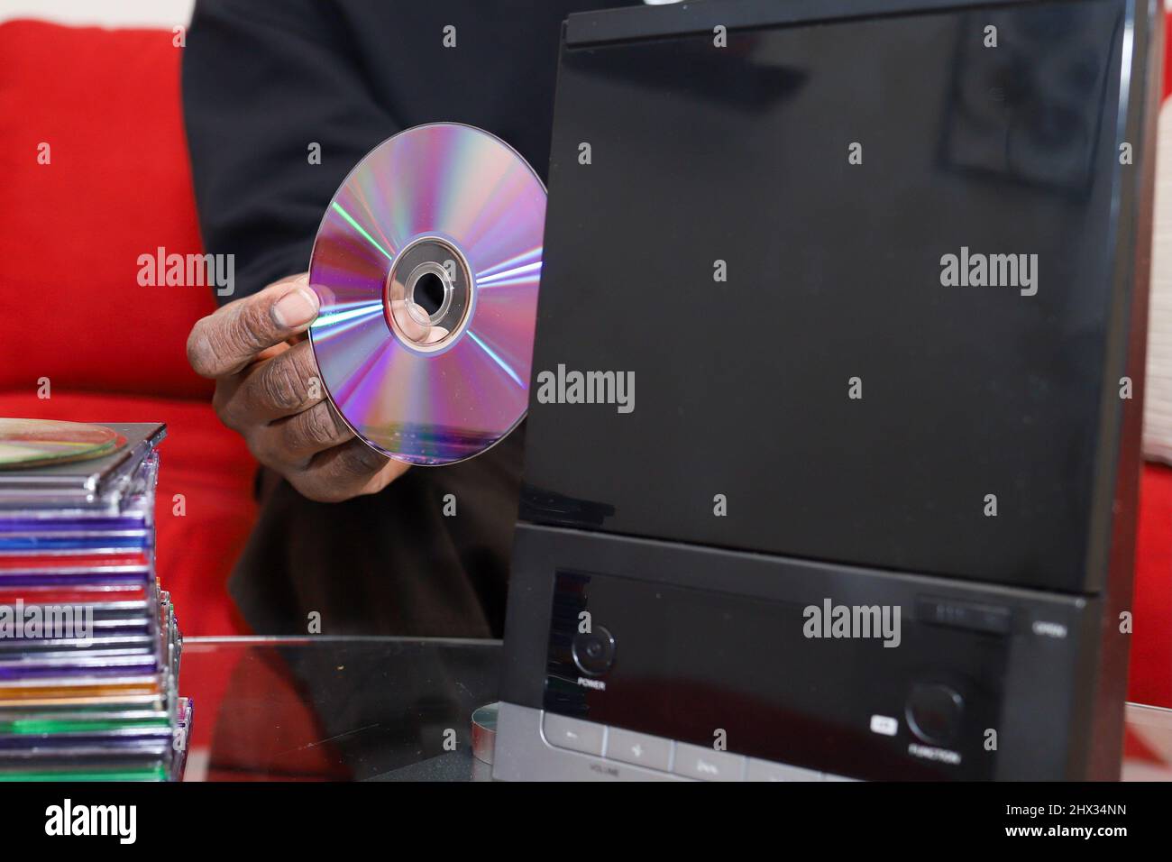 Hand holding cd hi-res stock photography and images - Alamy