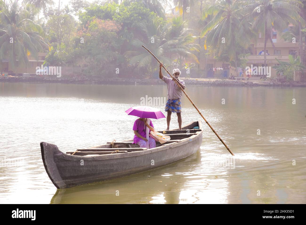 Primitive wooden transport boat in the Backwaters of Kerala, India ...
