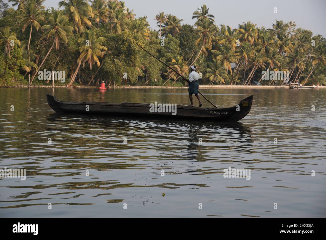Primitive wooden transport boat in the Backwaters of Kerala, India ...