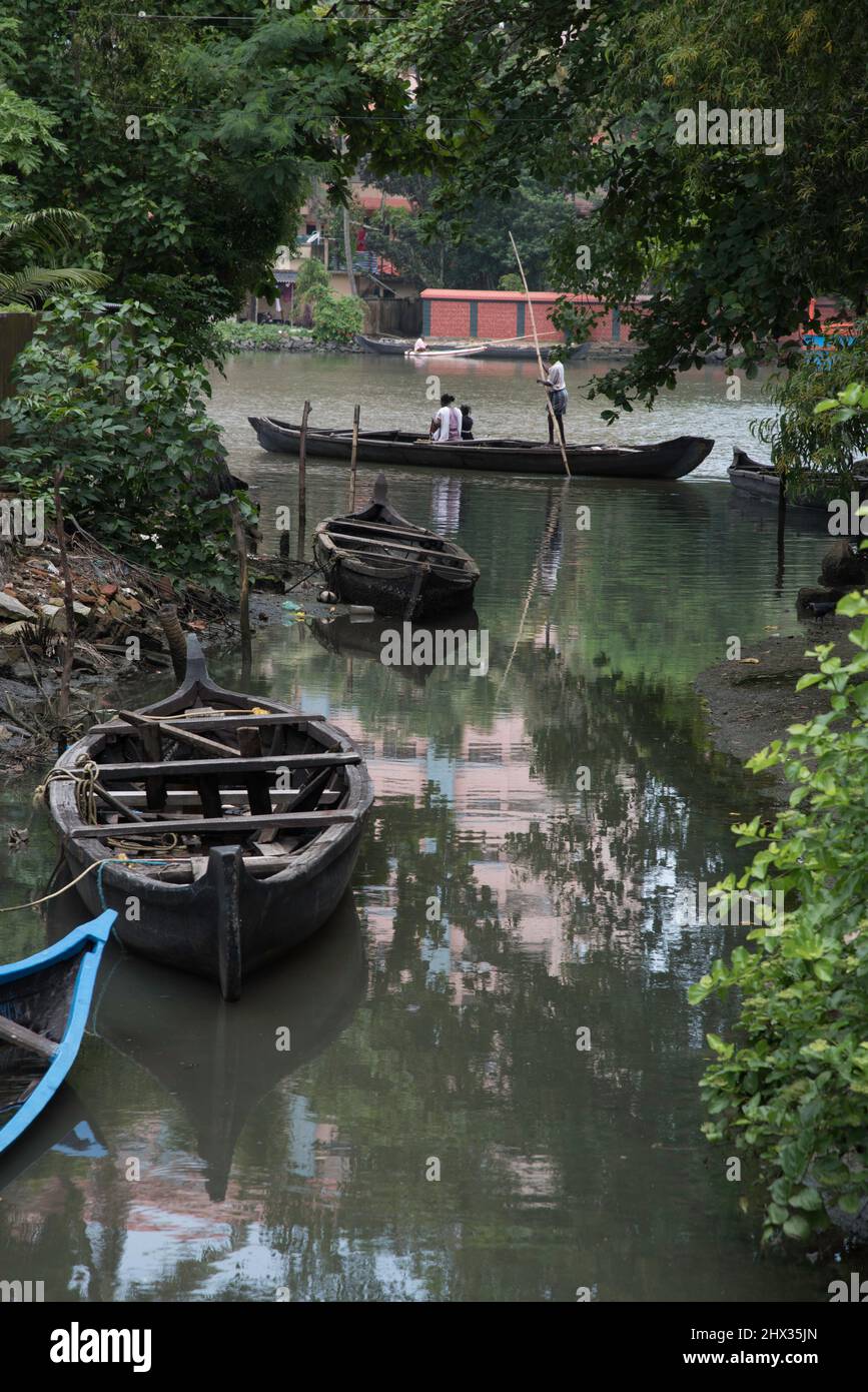 Primitive wooden transport boat in the Backwaters of Kerala, India ...