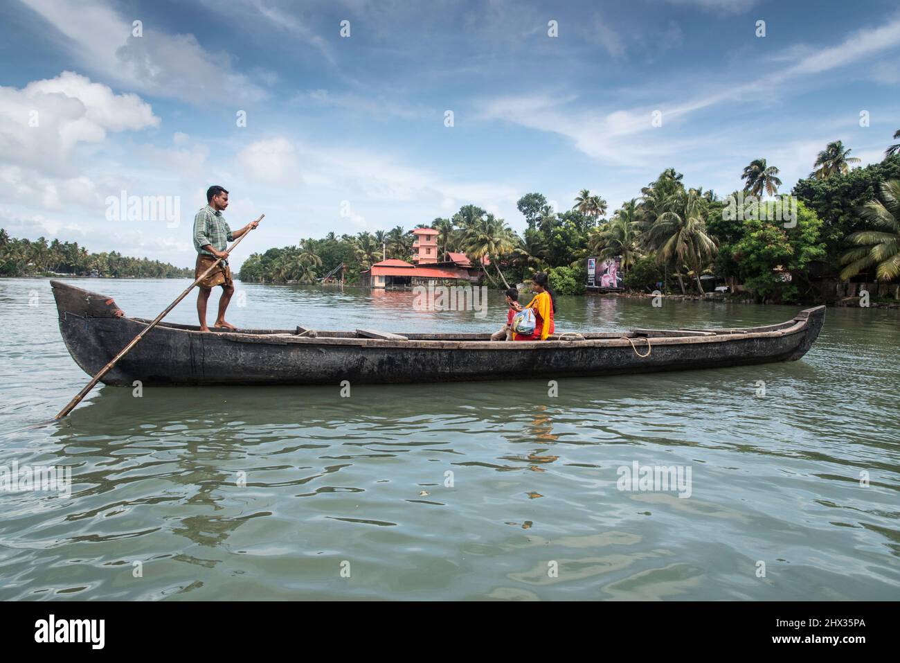 Primitive wooden transport boat in the Backwaters of Kerala, India ...