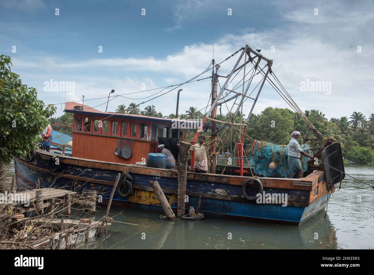 A traditional fishing boat in the Kerala backwaters, India Stock Photo ...