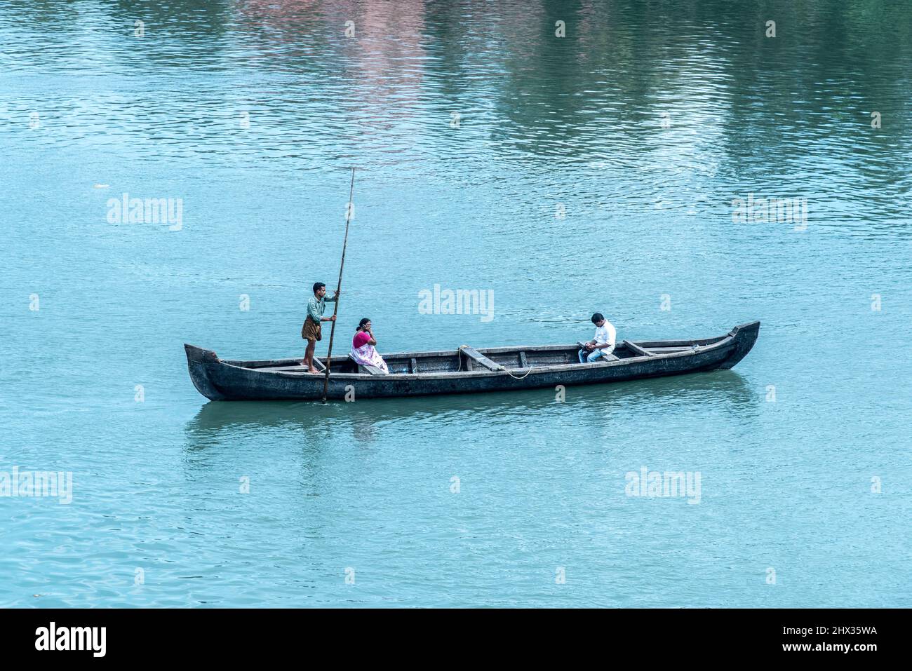 Primitive wooden transport boat in the Backwaters of Kerala, India ...