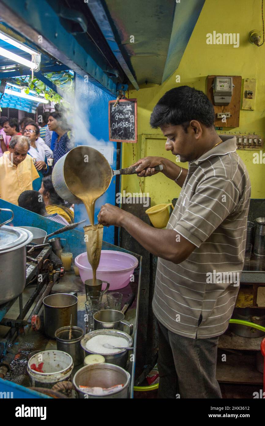 street vendor making chai Photographed in India Stock Photo - Alamy