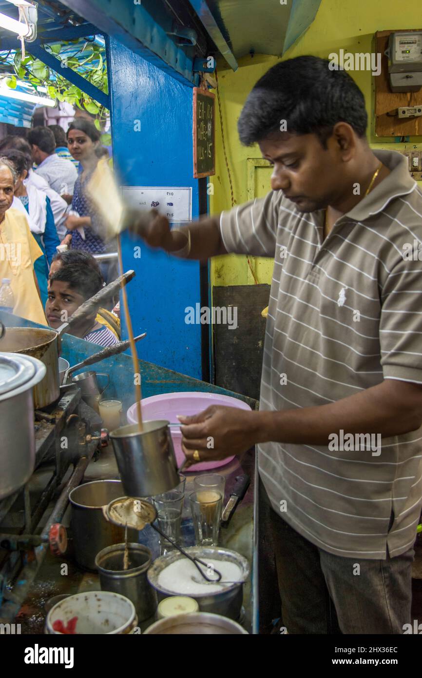 street vendor making chai Photographed in India Stock Photo - Alamy