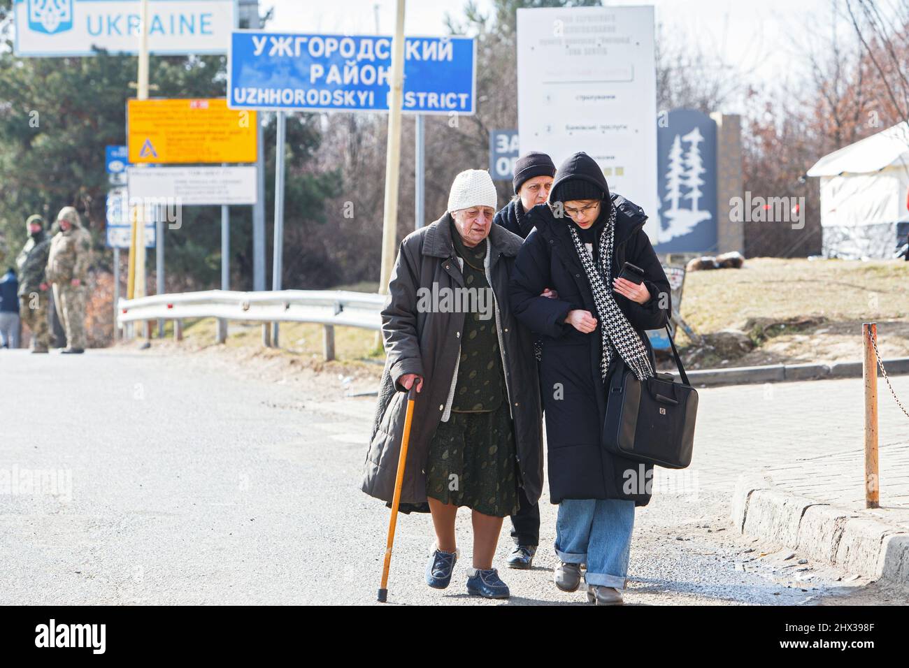ZAKARPATTIA REGION, UKRAINE - MARCH 8, 2022 - A woman supports an ...