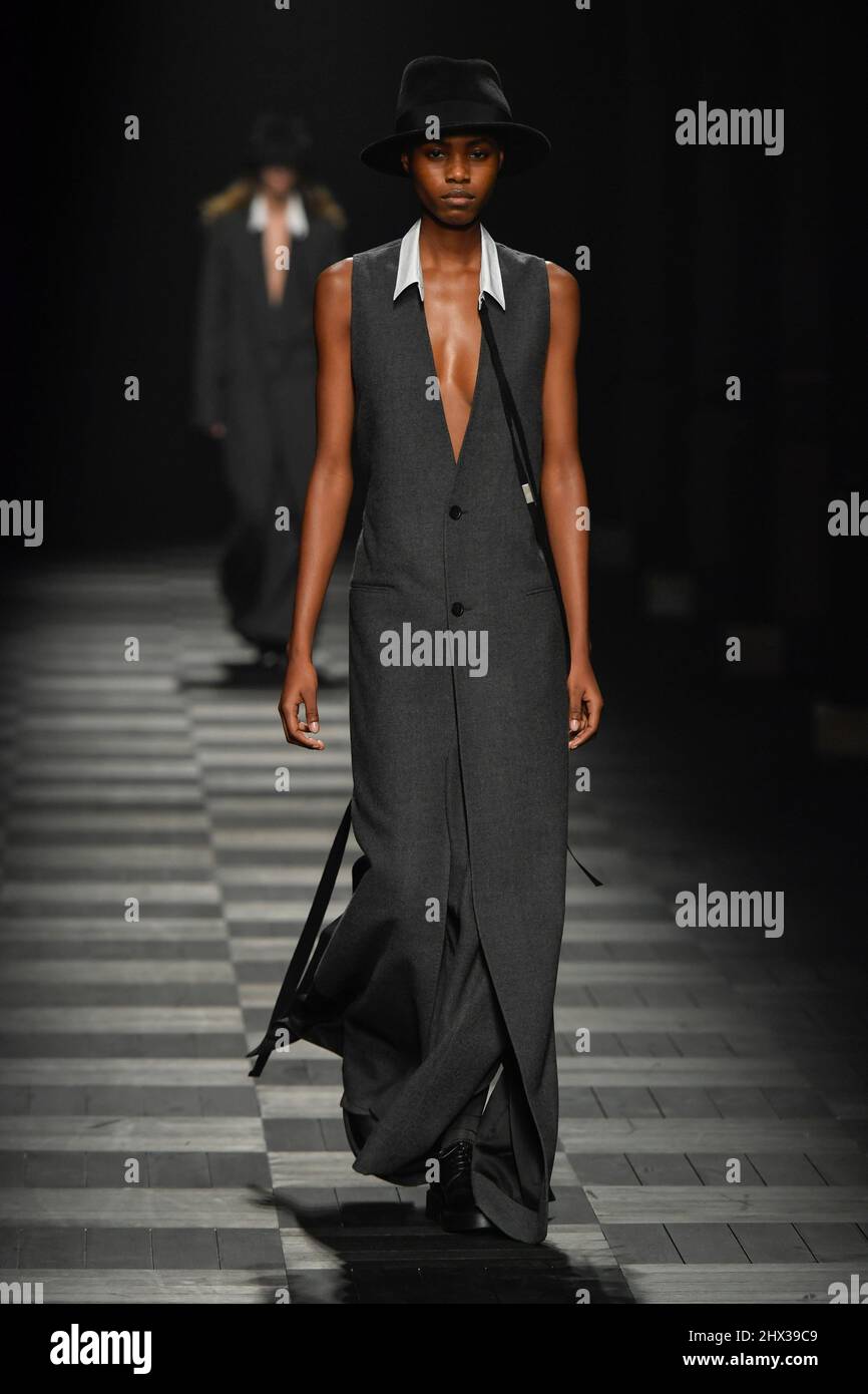 Model Victoria Fawole walks on the runway at the Ann Demeulemeester ...