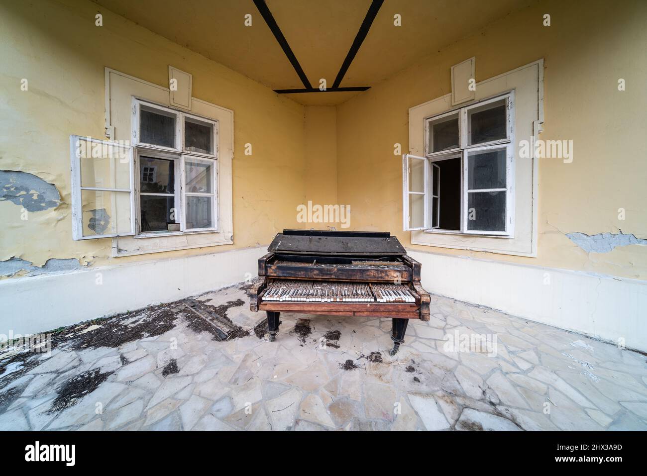 beautiful abounded castle with old piano Stock Photo - Alamy