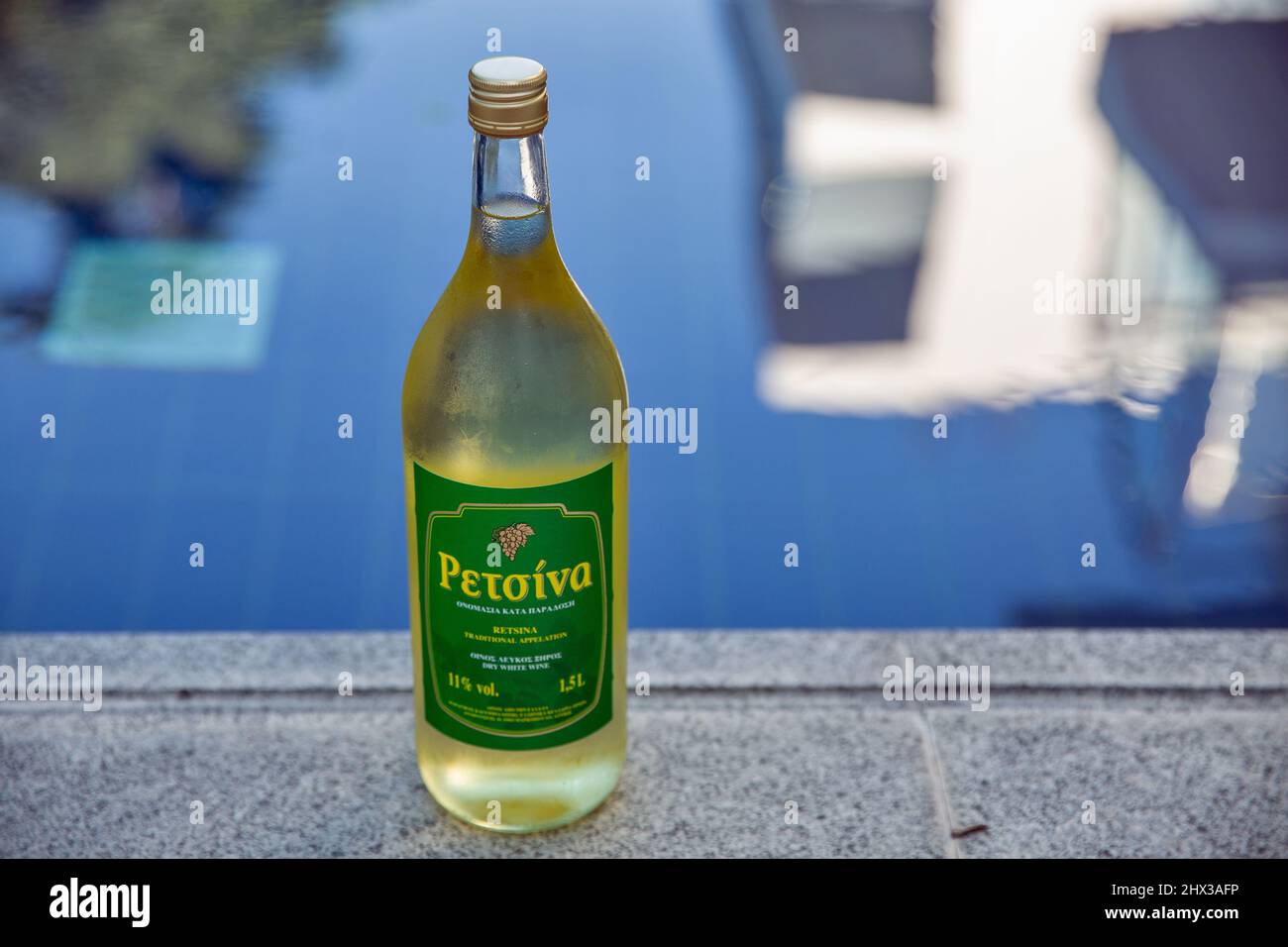 Ayia Napa, Cyprus - May 26, 2021: Retsina Greek traditional wine misted ...