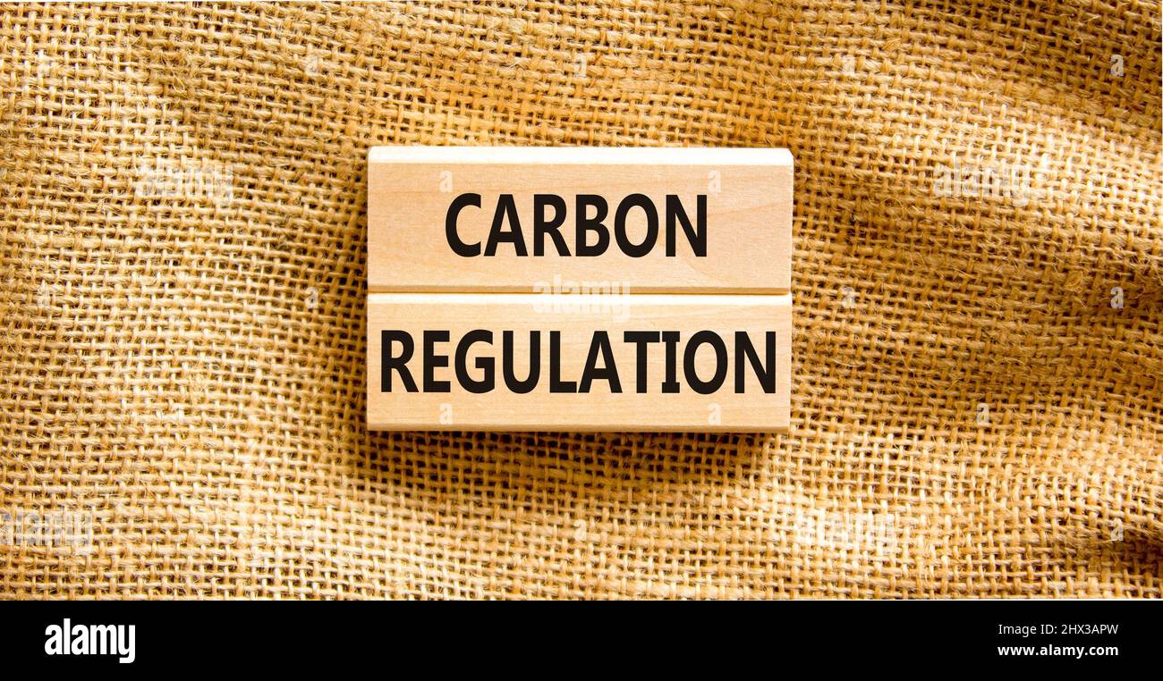 Carbon regulation symbol. Concept words Carbon regulation on wooden ...