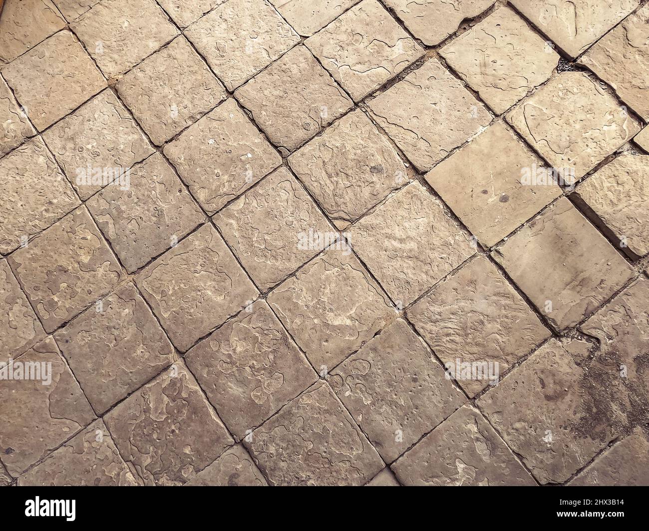 Antique stone flooring. Stone tiles in ancient church. Abstract ...