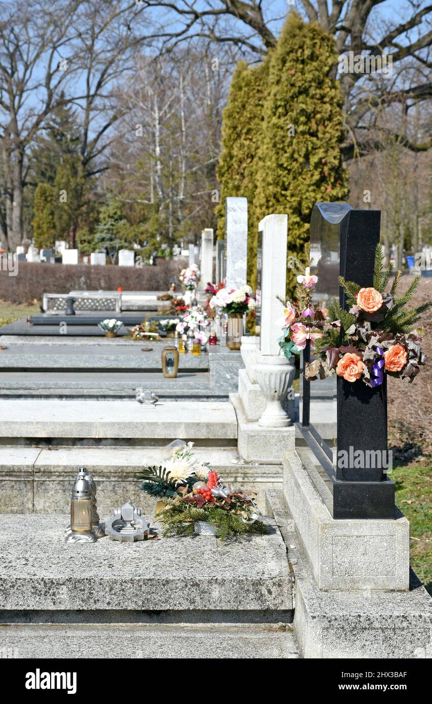 Tombstones in the public cemetery Stock Photo - Alamy