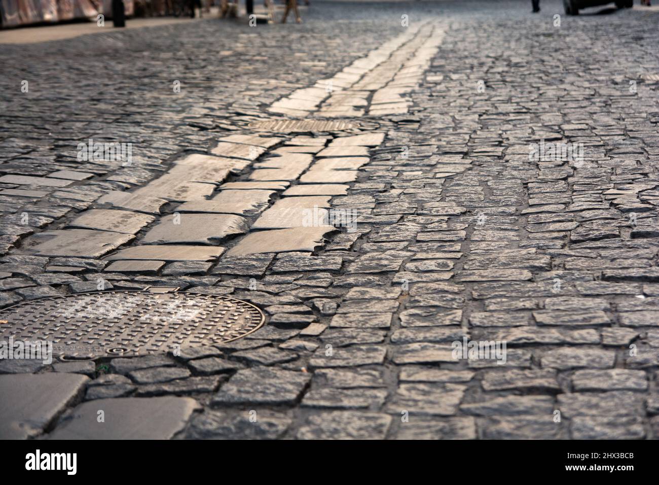 Cobblestone road from a large stone Stock Photo - Alamy