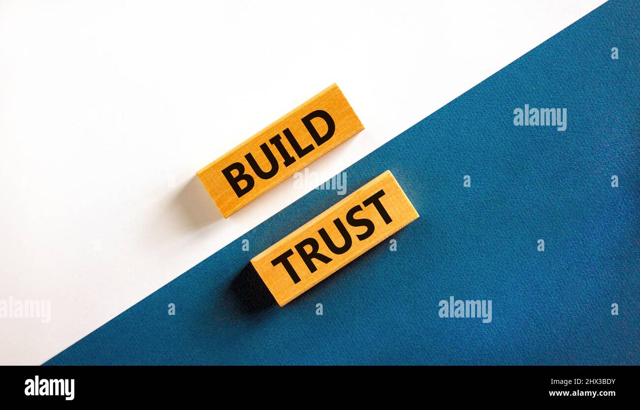 Build trust symbol. Concept words Build trust on wooden blocks on a ...