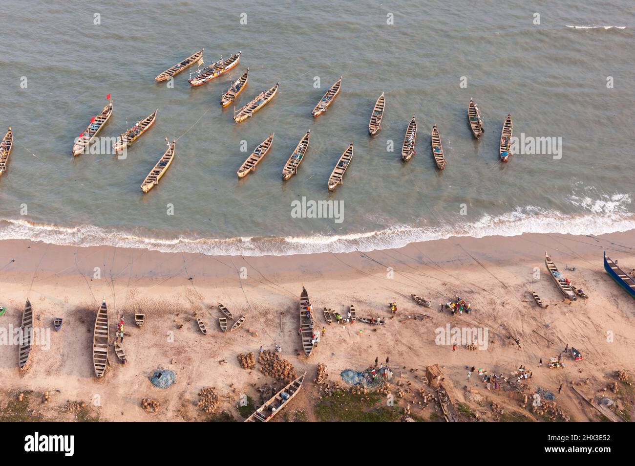A birds eye view of a Ghanaian beach east of the capital Accra,dugout ...