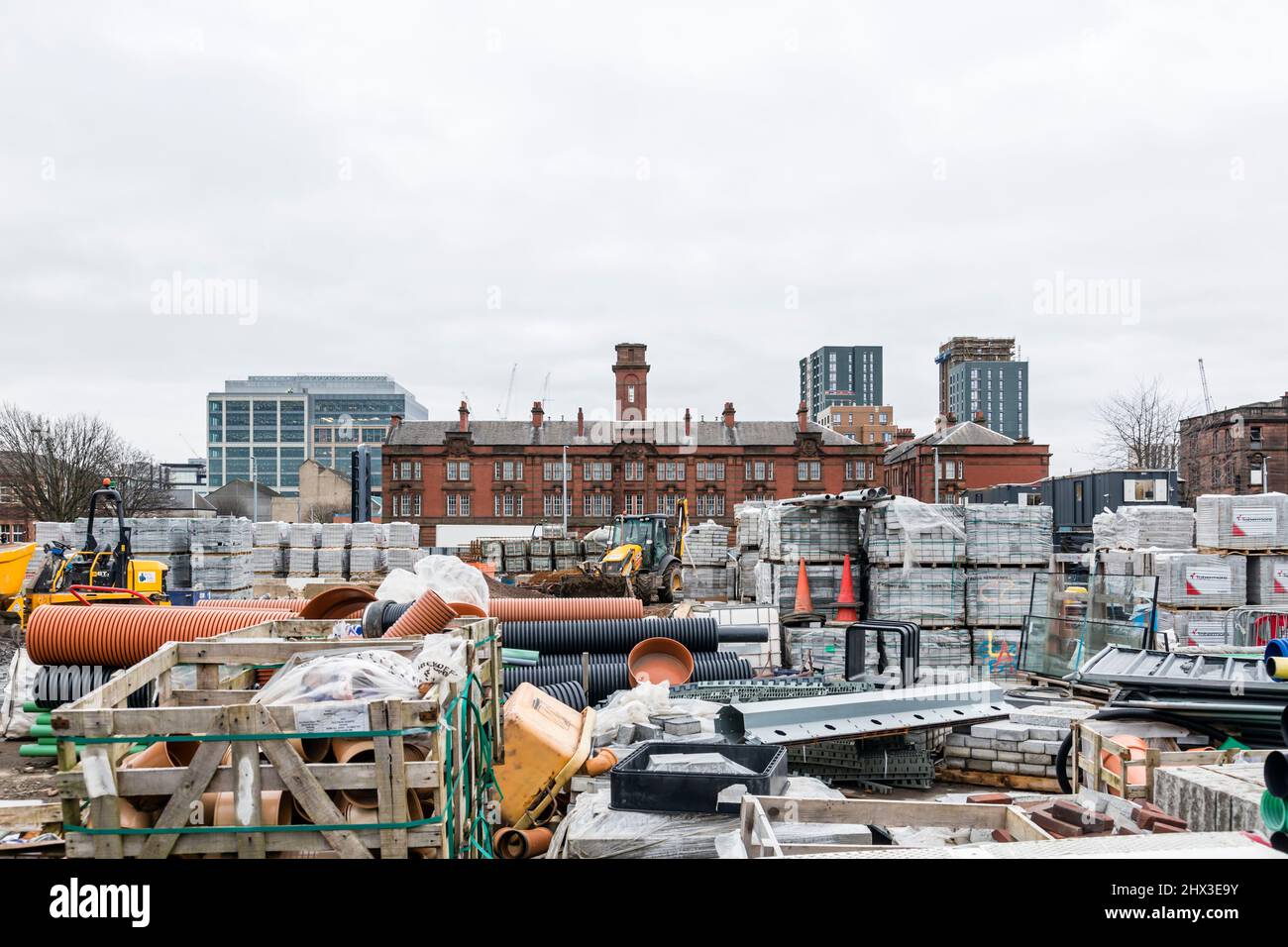 Materials stored in a yard during construction of offices and ...