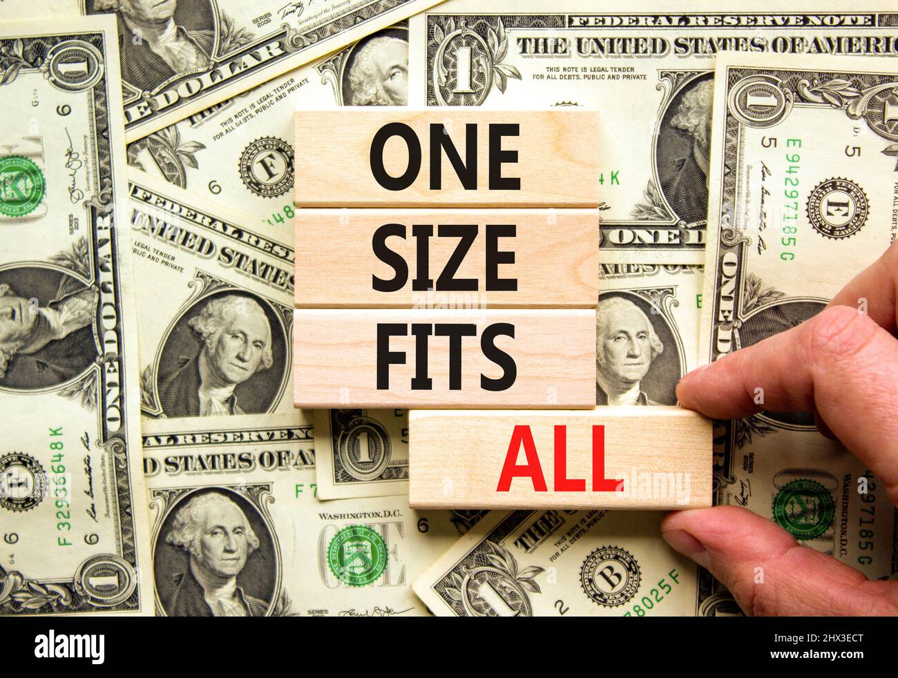 One size fits all symbol. Concept words One size fits all on wooden ...