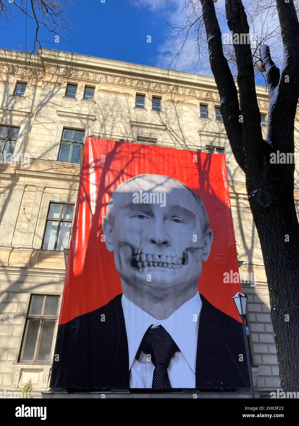 Riga, Latvia. 09th Mar, 2022. A large poster with a portrait of Russian ...