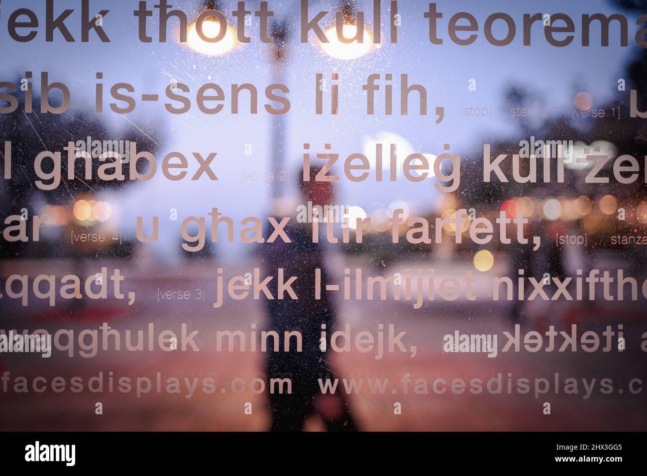 Maltese text at the bus stop Stock Photo - Alamy