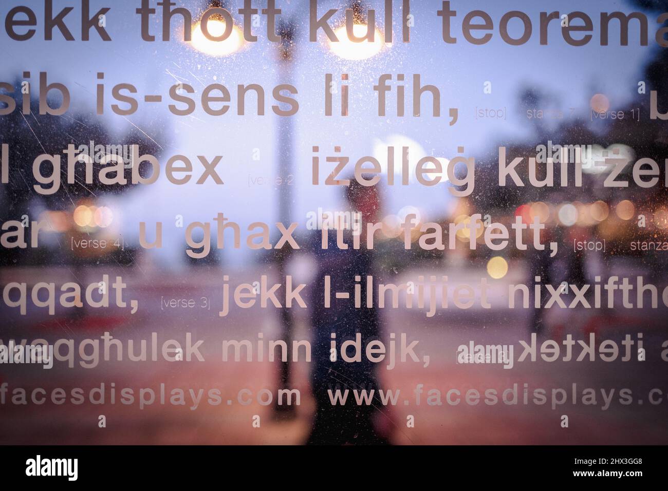 Maltese text at the bus stop Stock Photo - Alamy