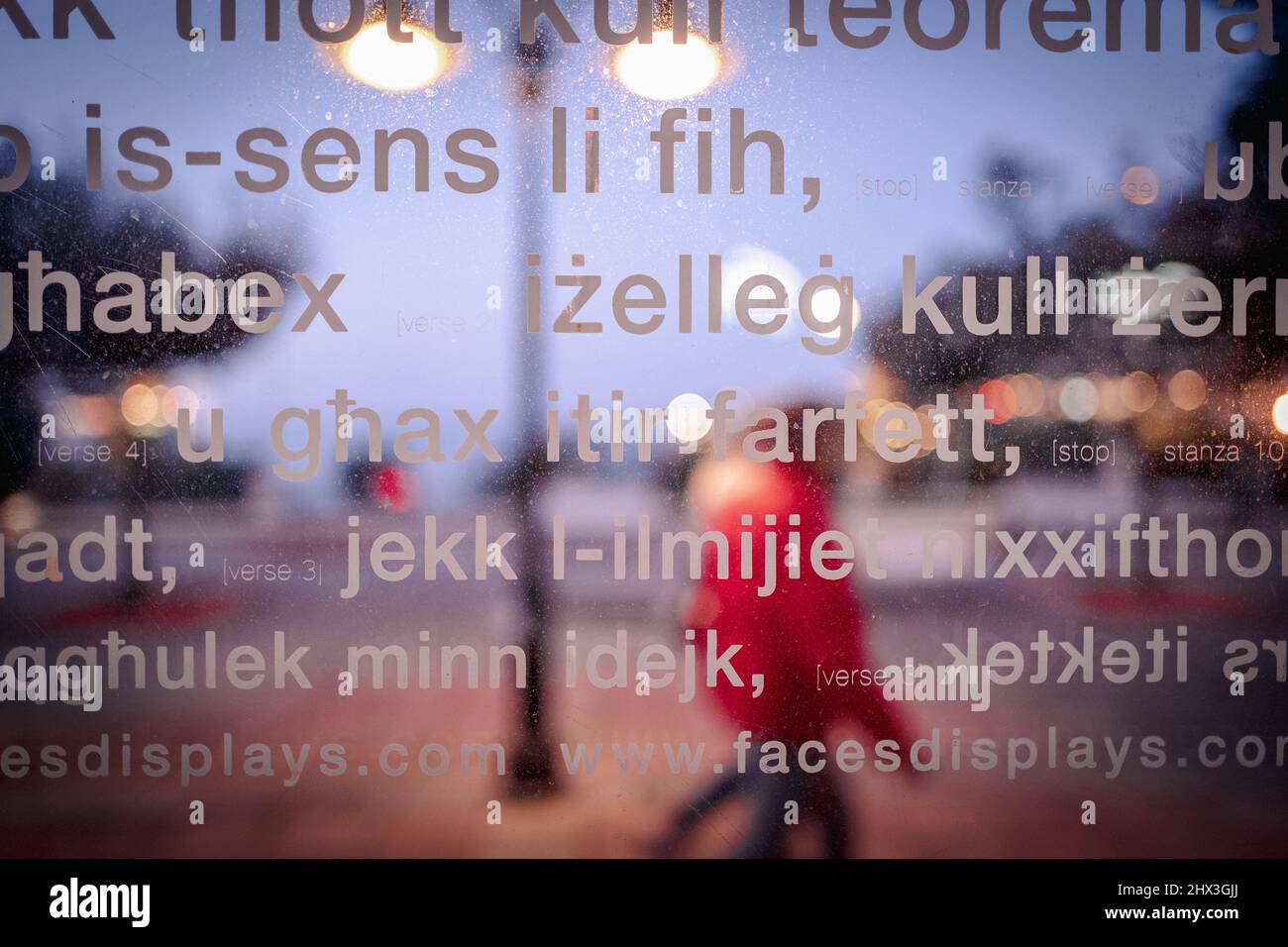 Maltese text at the bus stop Stock Photo - Alamy