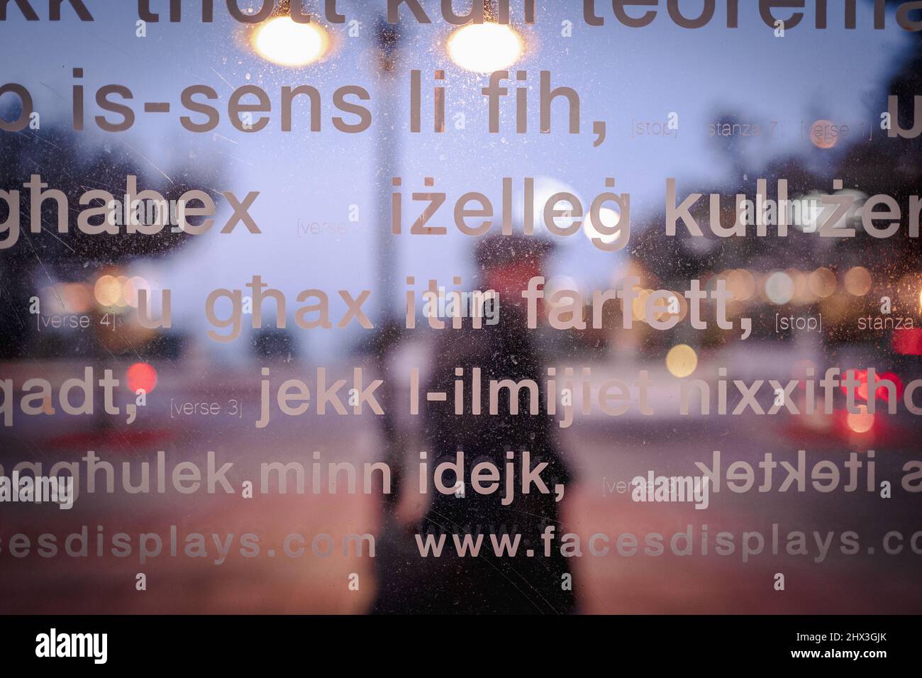 Maltese text at the bus stop Stock Photo - Alamy