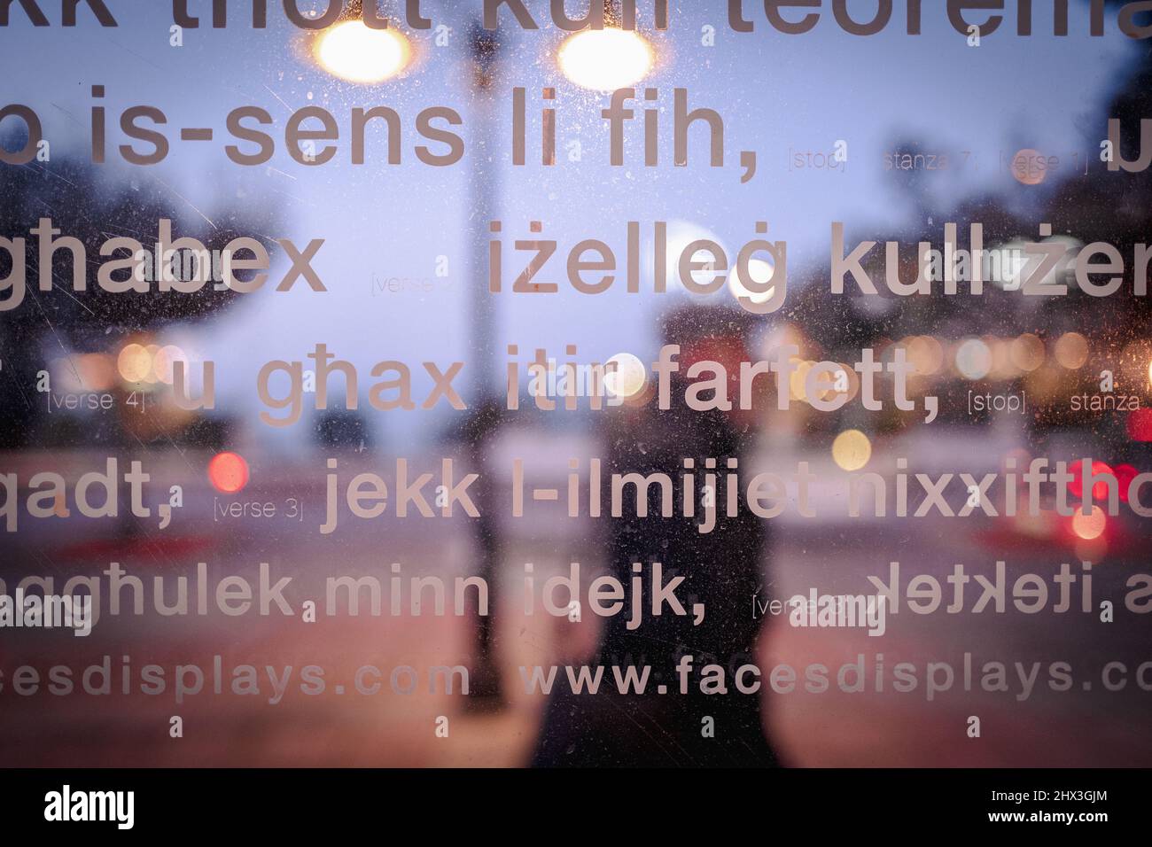 Maltese text at the bus stop Stock Photo - Alamy