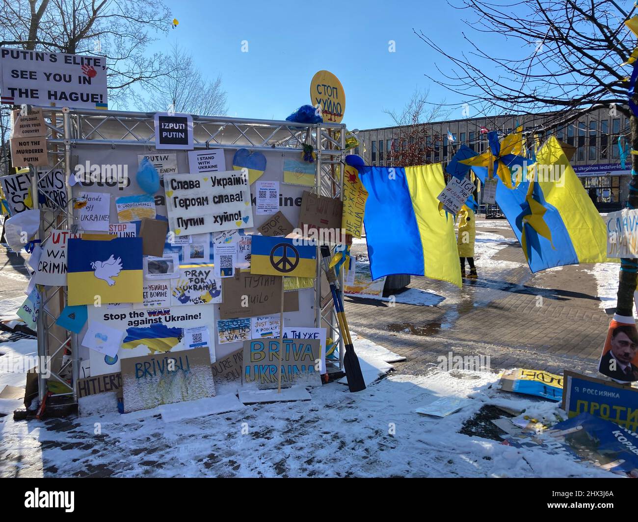 Riga, Latvia. 09th Mar, 2022. Ukrainian flags, protest posters and ...