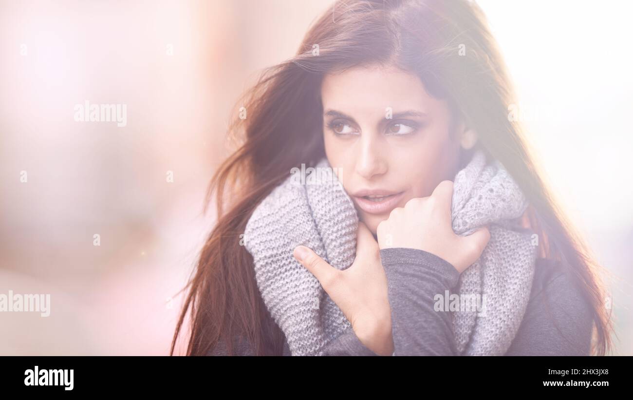 Staying classy in the cold. Cropped shot of a beautiful young woman ...