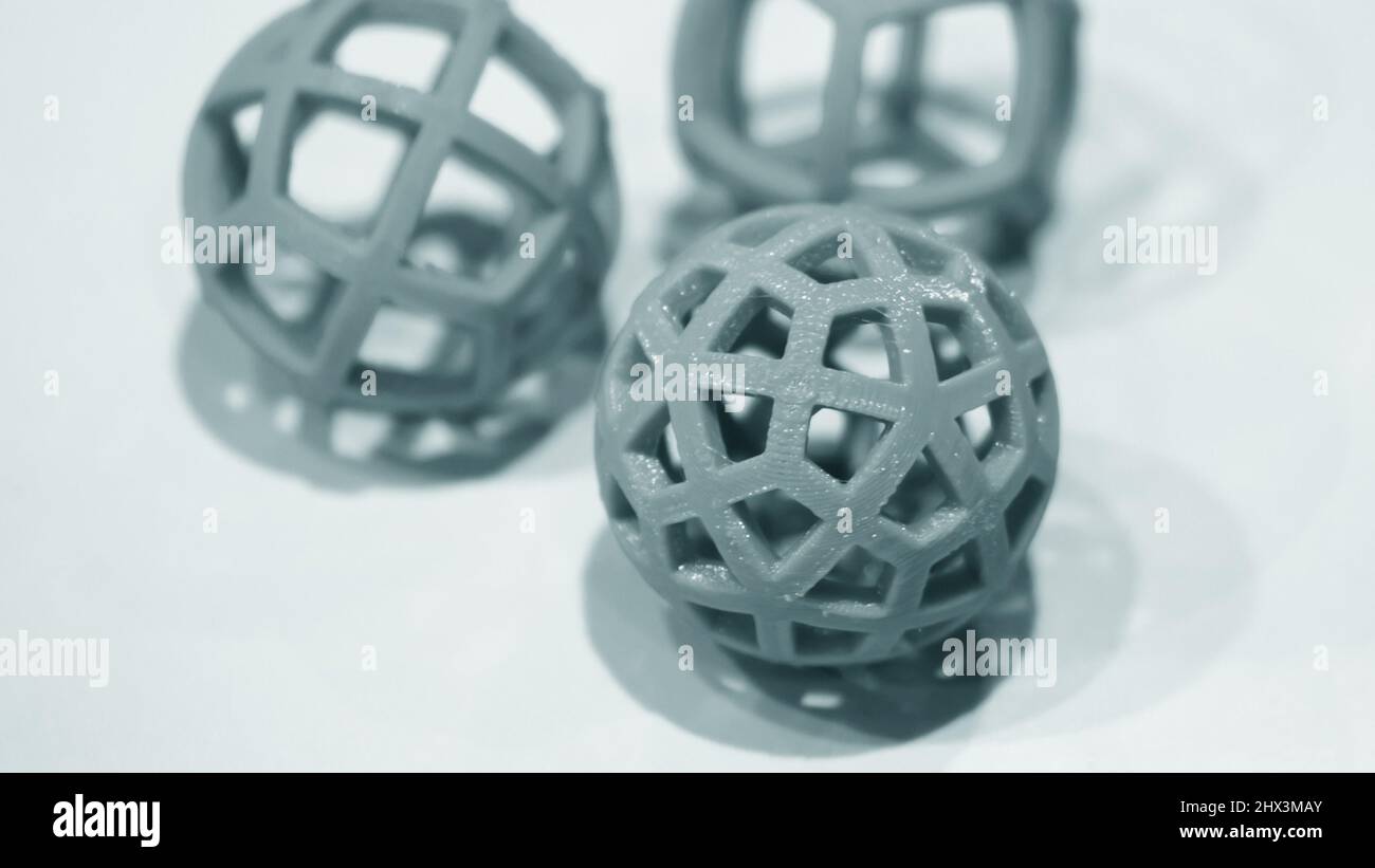 Abstract object of a blue color printed by 3d printer on white ...