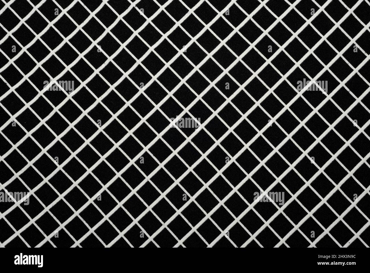 Background from fabric in a cage. Checkered material close up Stock ...
